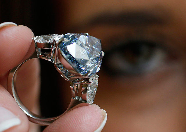 Blue diamond soars to world record $57.6 million at Christie's | GMA ...