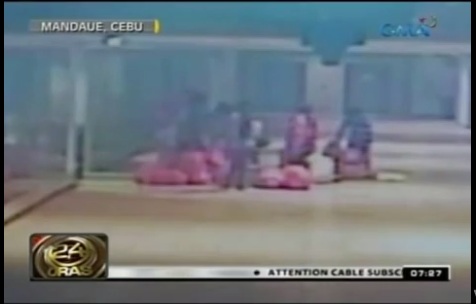 CCTV footage shows thieves stealing goods meant for Yolanda survivors ...