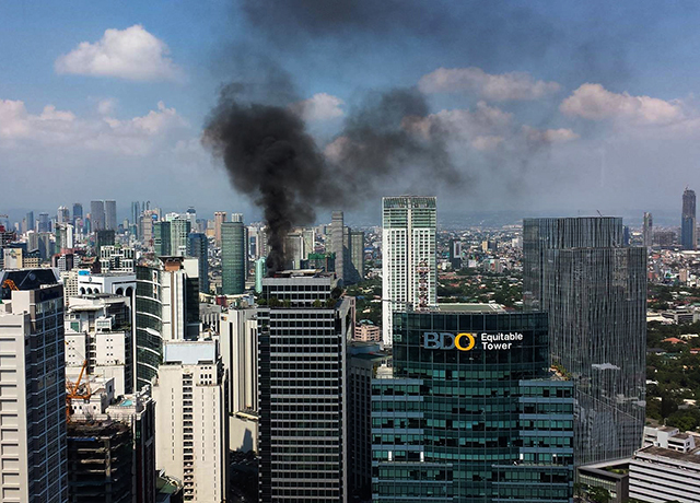 Brief fire prompts evacuation at Makati bank building | GMA News Online