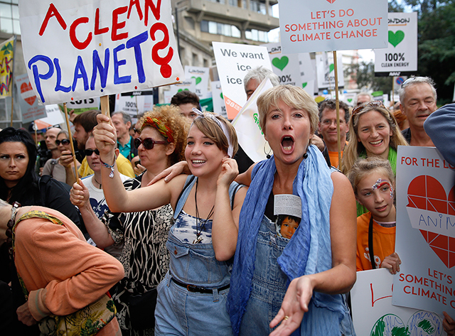 Climate protesters march on Wall Street, block street near NYSE | GMA ...