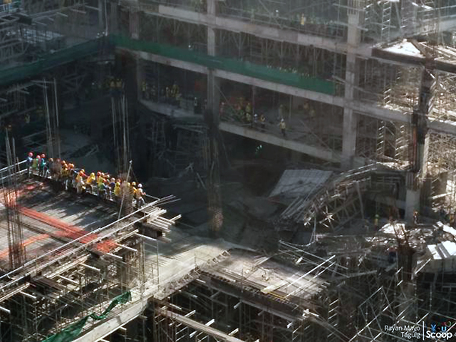 DOLE halts construction work for Taguig building after deadly collapse ...