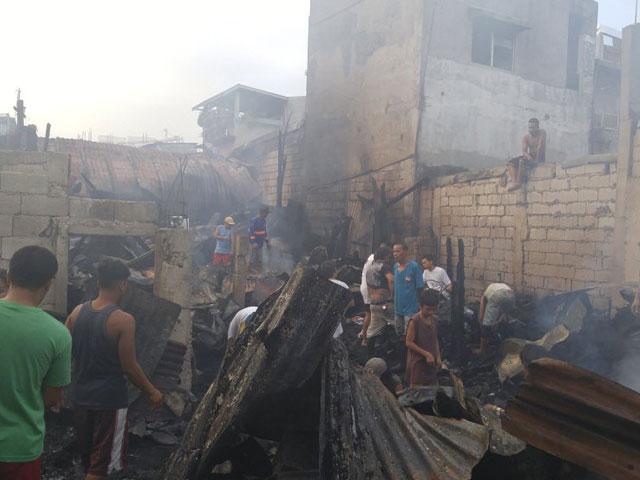 Fire destroys 100 houses in Manila’s Tondo dristrict | GMA News Online