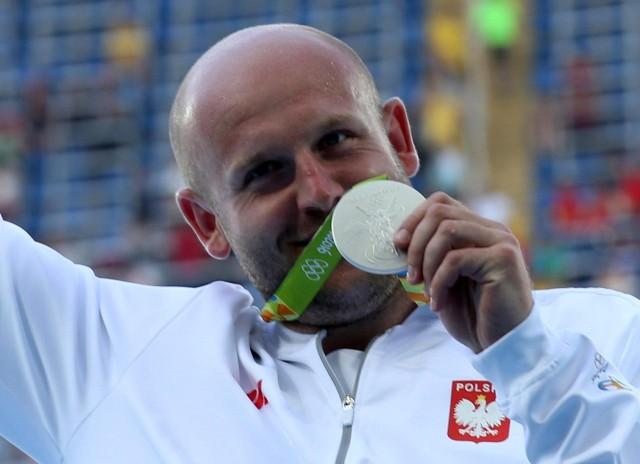 Polish athlete puts Olympic medal up for sale to help boy with cancer ...