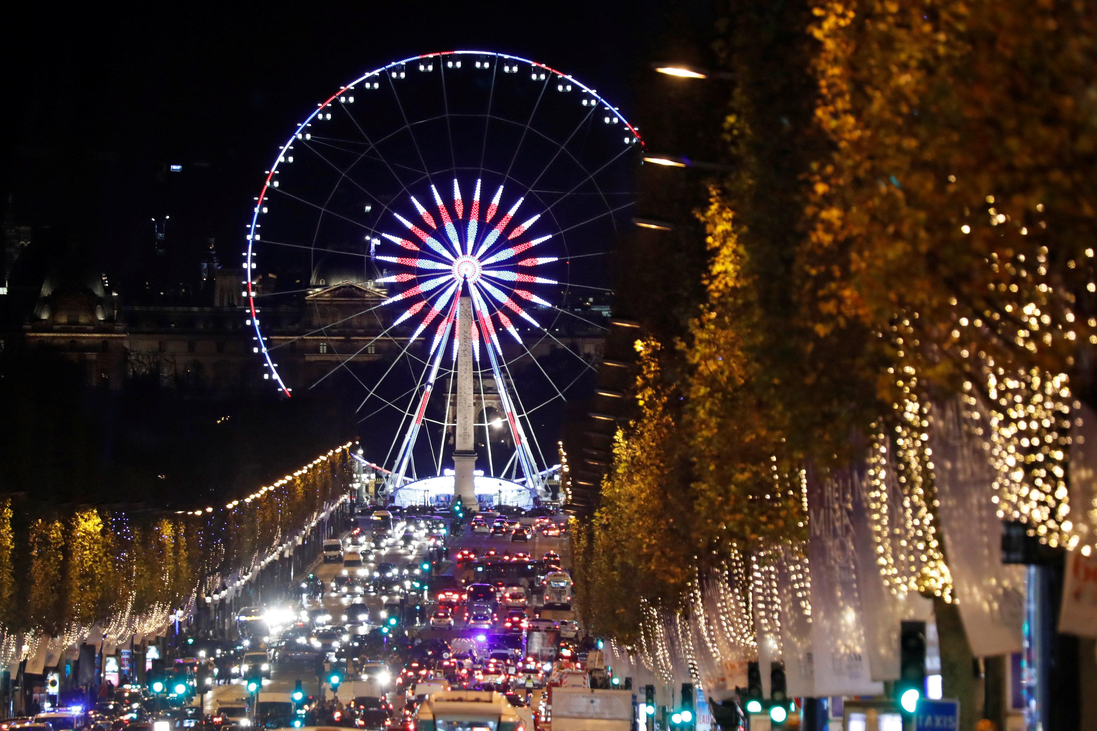 Paris' Champs-Elysees lit up with Christmas sparkle | GMA News Online