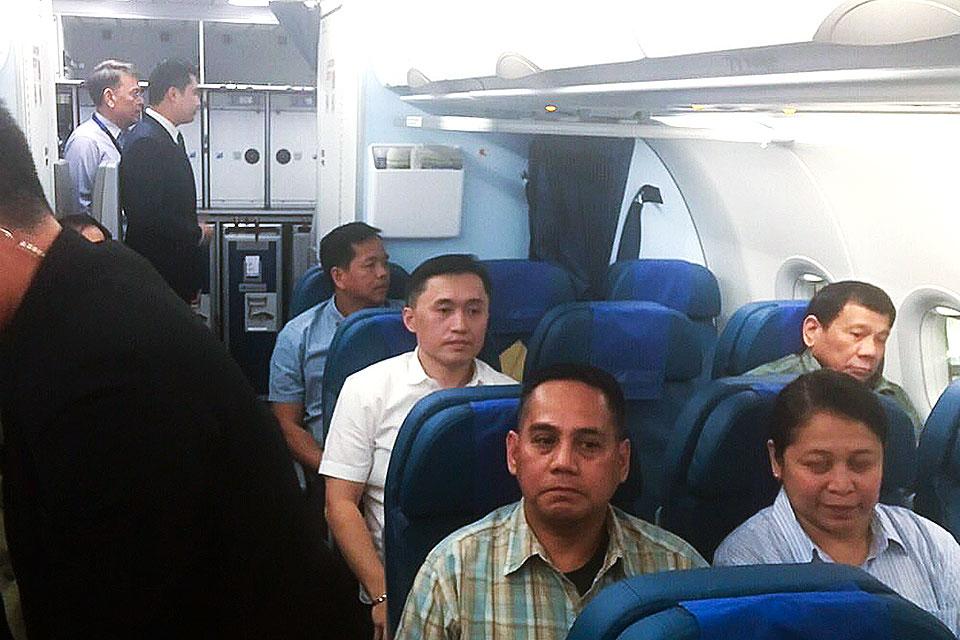 Duterte takes commercial flight back to Manila | Photos | GMA News Online