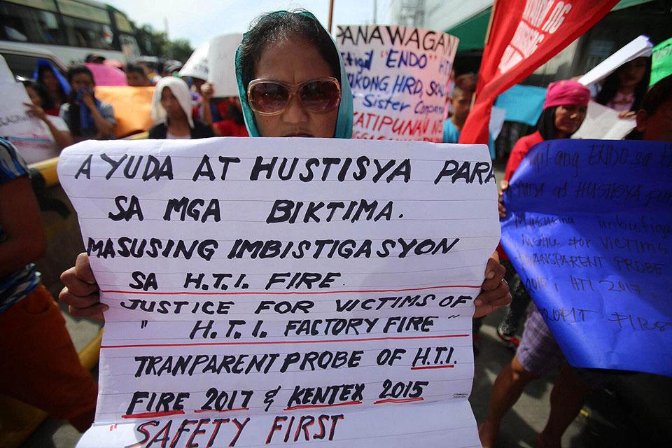 Workers want probe of HTI fire | Photos | GMA News Online