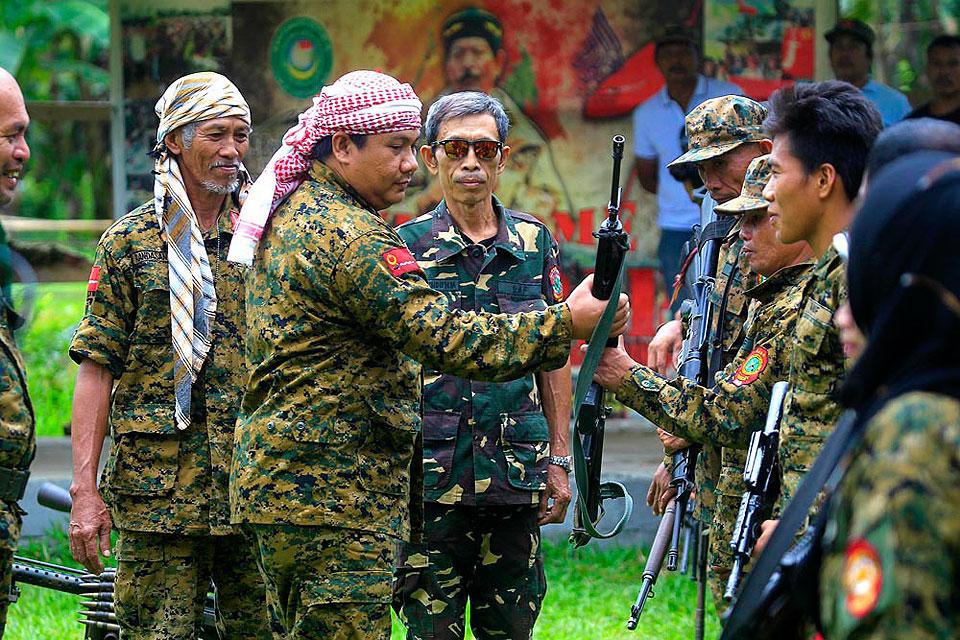 Soldiers flag down MNLF members on Buluan highway, seize 50 firearms ...