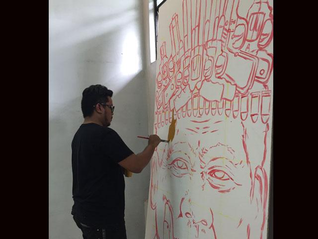 Street artist creates mural of Duterte wearing crown of guns ...