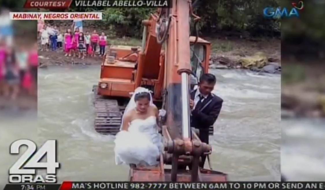 Backhoe bride and groom scooped up to make it to wedding | GMA News Online