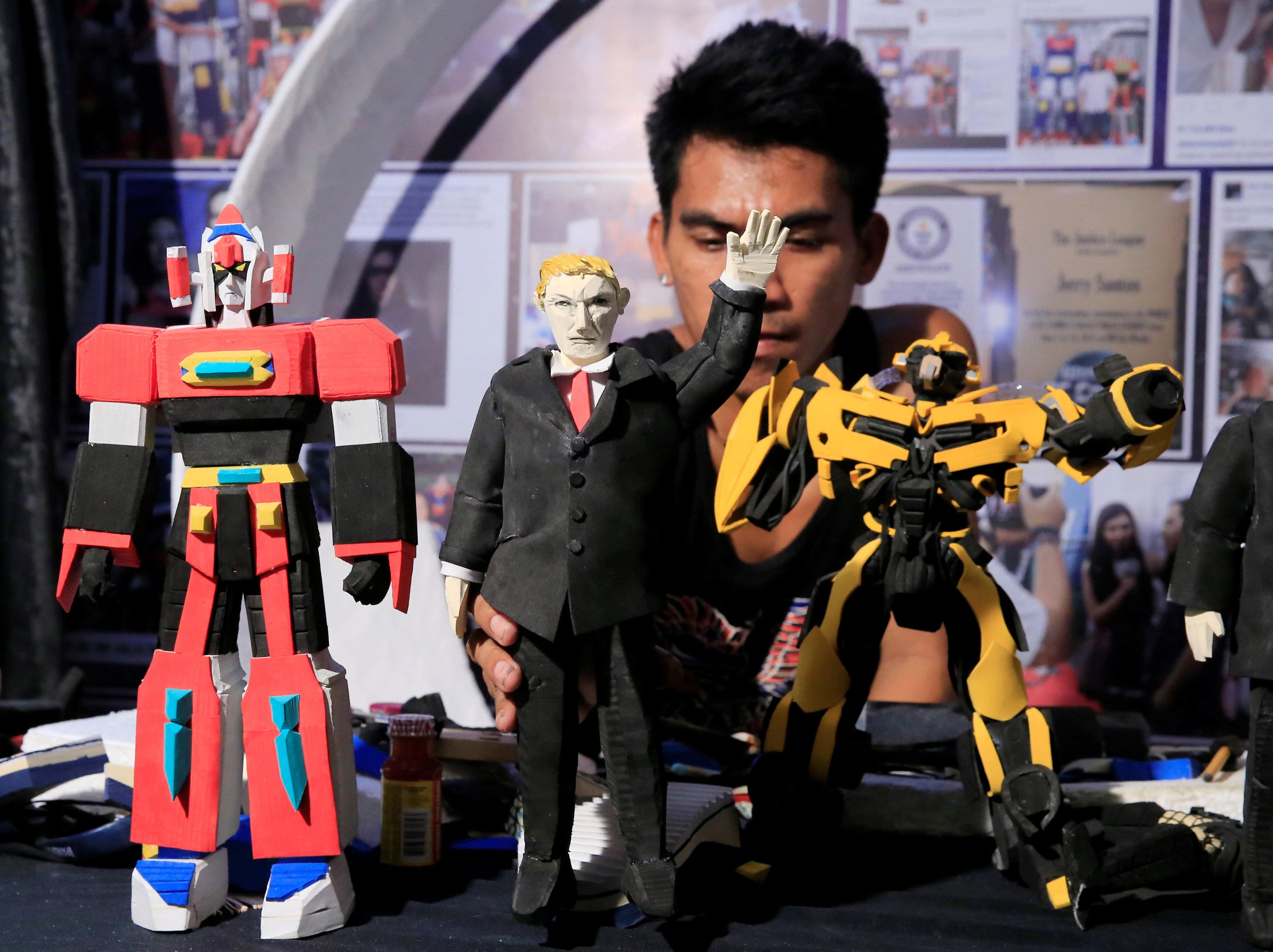 Pinoy artist makes Trump action figure from flip flops | GMA News Online