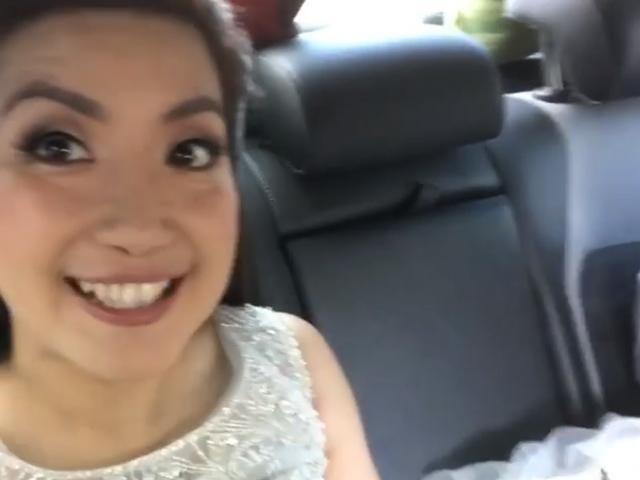 Kara David shares a video of herself as a giddy bride on the way to church