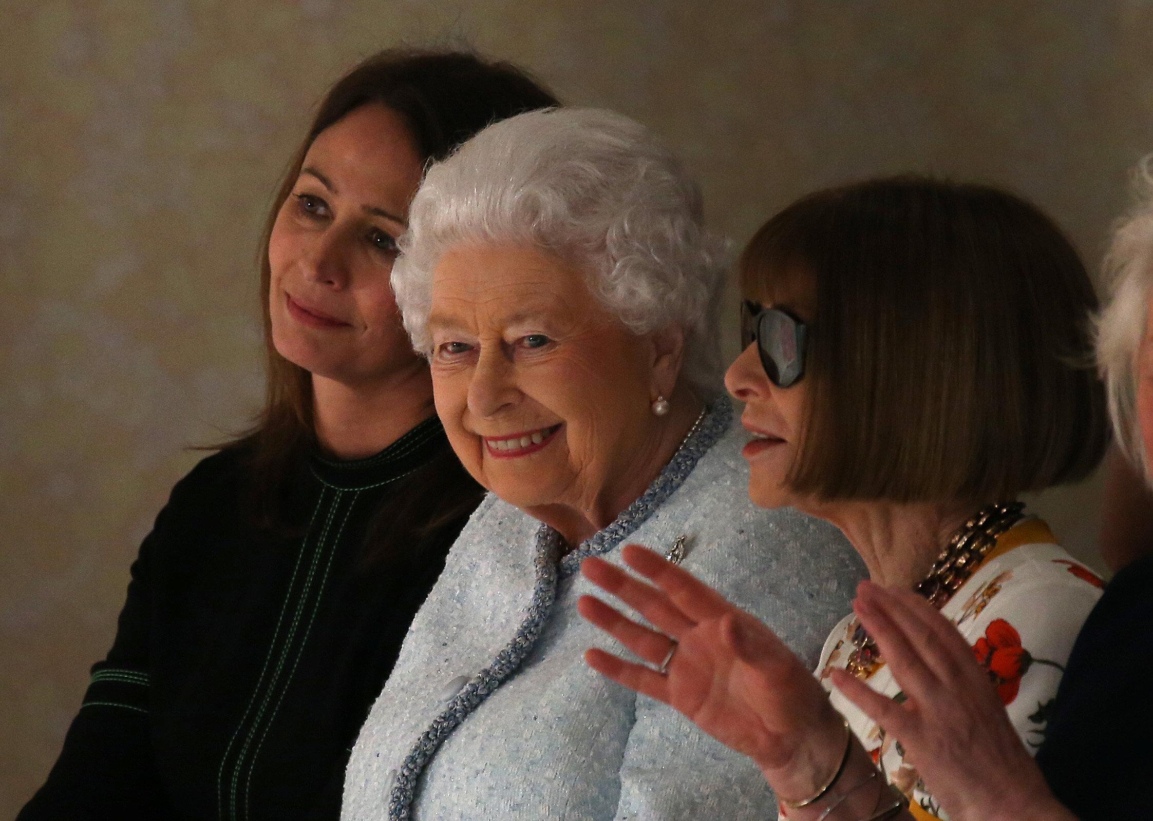 Queen Elizabeth makes surprise appearance at London fashion catwalk ...
