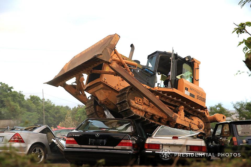 Smuggled luxury cars destroyed | Photos | GMA News Online