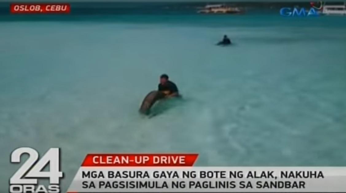 Sandbar clean-up yield broken bottles, tires, other trash in Oslob ...