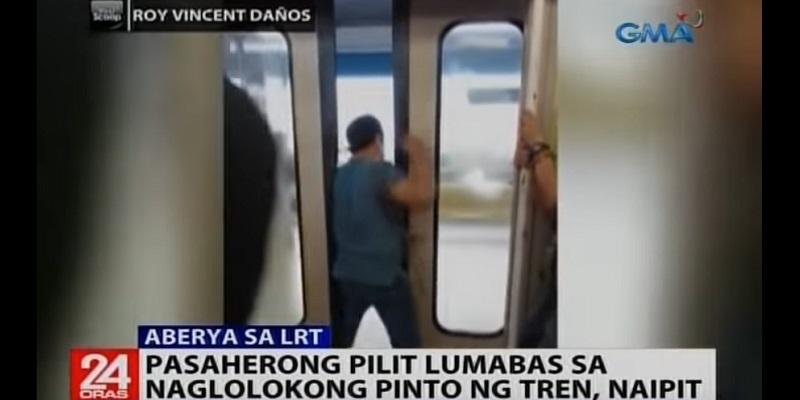 Lalaki, naipit sa naglolokong pinto ng LRT-1 | Balitambayan Lalaki, naipit sa naglolokong pinto ng LRT-1 | Balitambayan