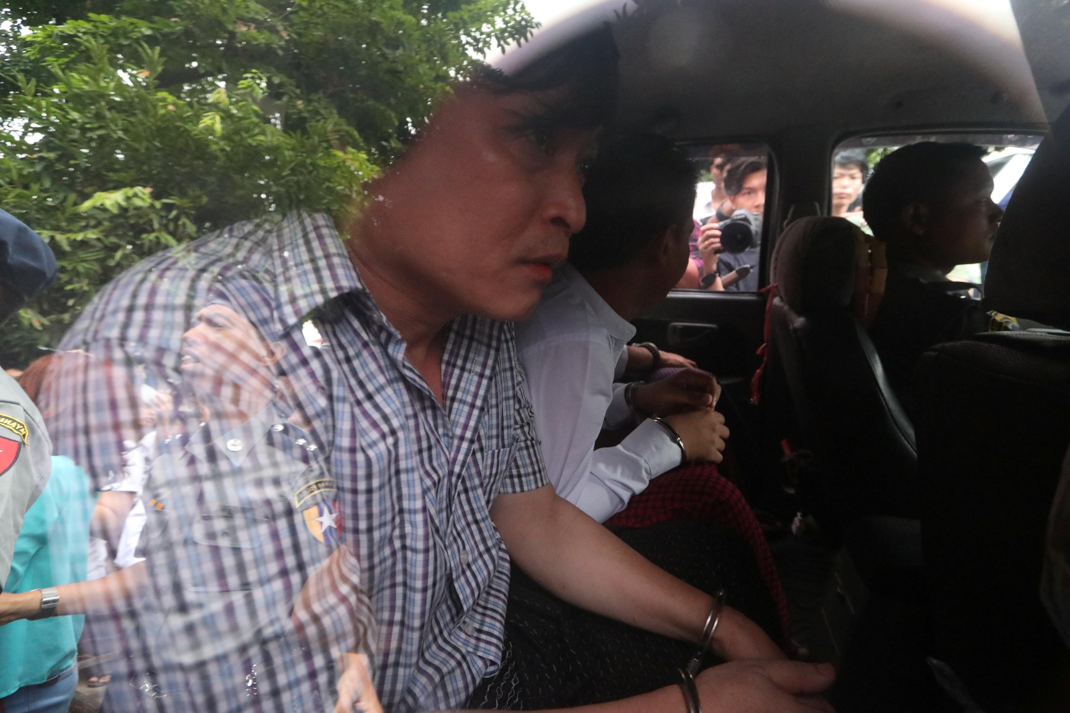 Myanmar newspaper journalists held after handing themselves in to ...