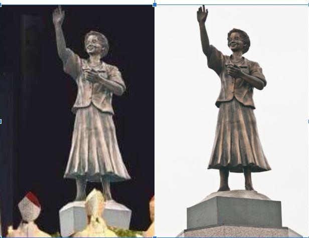 No, this photo does not show clergy praying in front of a statue of ...