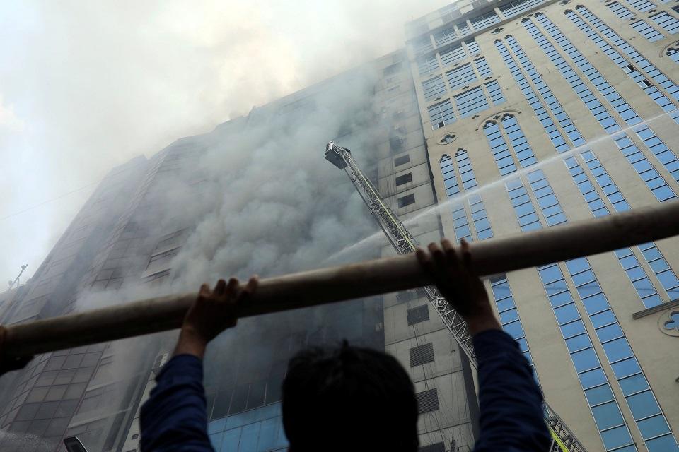 Blaze at high-rise in Bangladesh kills at least five, 60 injured, many ...