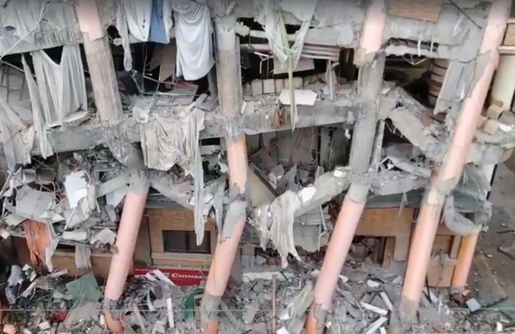 Drone video shows broken columns, strewn curtains at Eva's Hotel | GMA ...