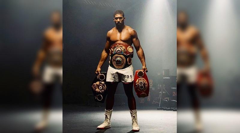 Britain’s Joshua to defend heavyweight titles in London on June 20 ...