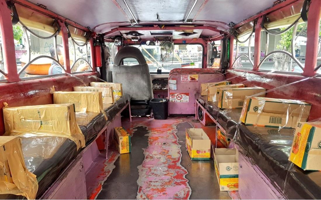 Jeepney drivers use boxes to enforce social distancing amid COVID-19 ...