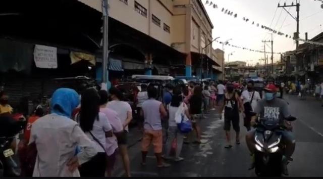 Residents flock to Pritil Market a day before total lockdown in Tondo ...