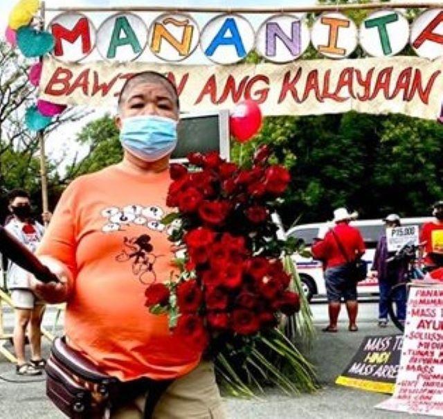 Activist Mae Paner dresses up as NCRPO's Sinas during 'mañanita' in UP ...