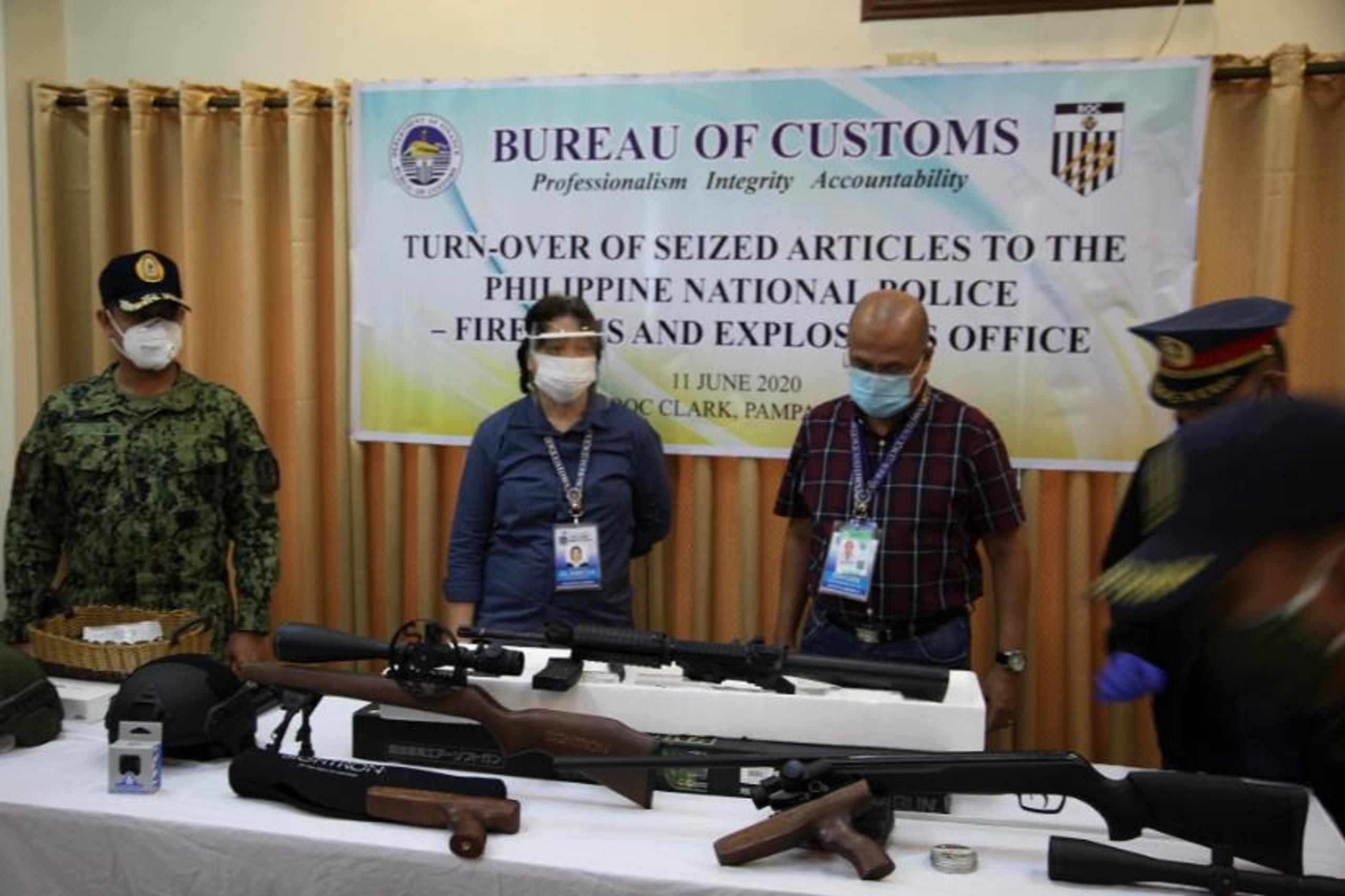 BOC turns over seized weapons, accessories to PNP | GMA News Online