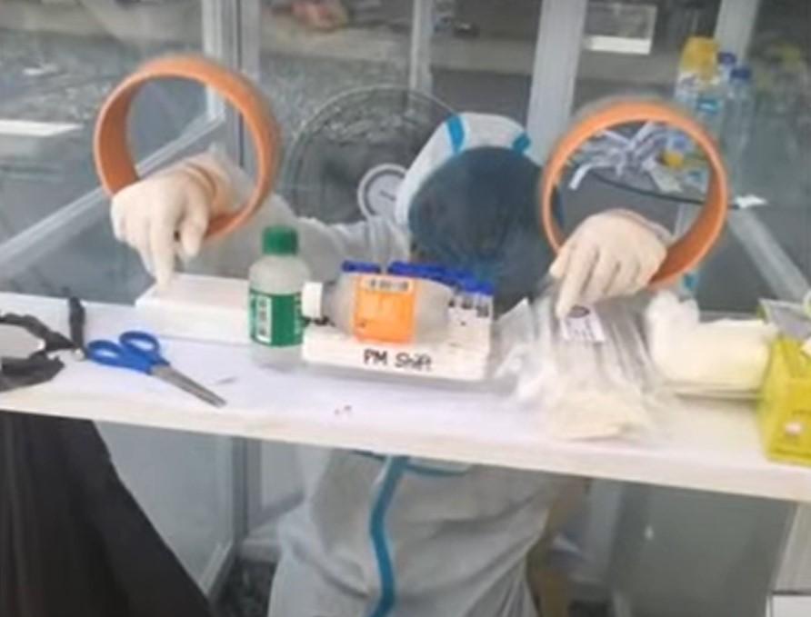COVID-19 swabber gives in to fatigue after 100 patients, goes viral ...