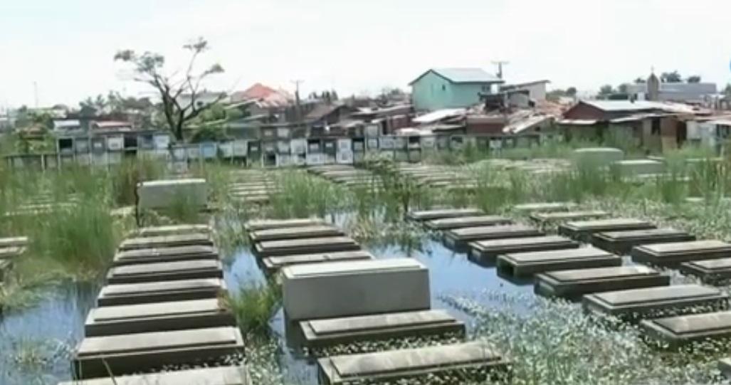 Pampanga residents brave flooded cemeteries ahead of week-long closure ...