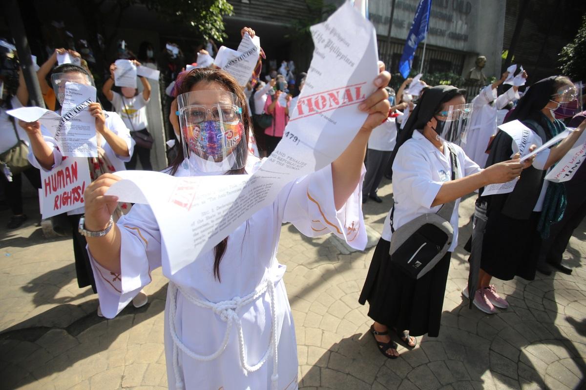 Religious group joins protest vs. anti-terror law | Photos | GMA News ...