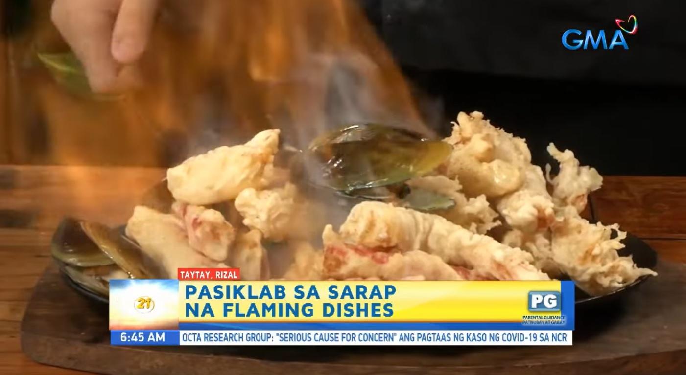 Here's how this Taytay restaurant makes its flaming seafood in marinara ...