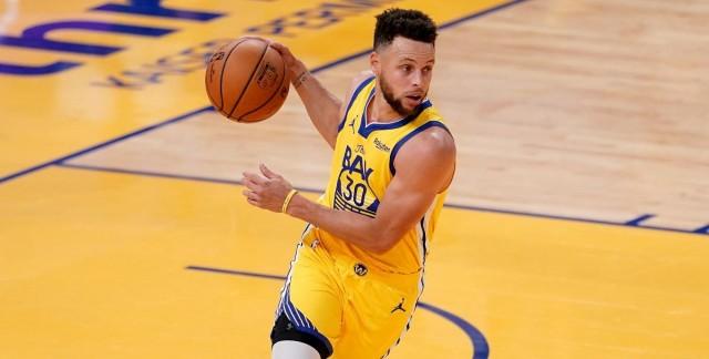 Stephen Curry pours in 41 as Warriors rally past Bucks