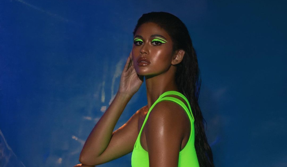 Taguig’s Katrina Dimaranan glows in neon green ahead of Miss Universe ...