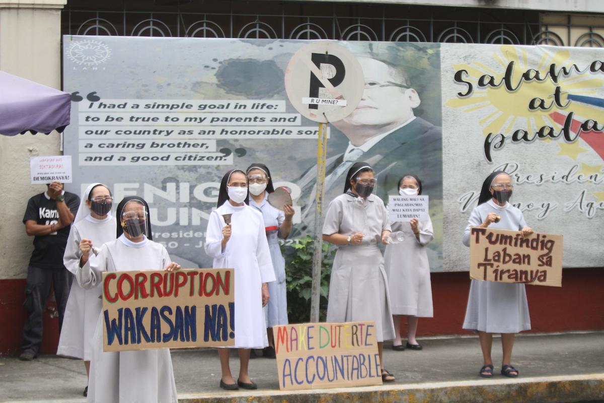 Nuns hold protest action, call for good governance | Photos | GMA News ...