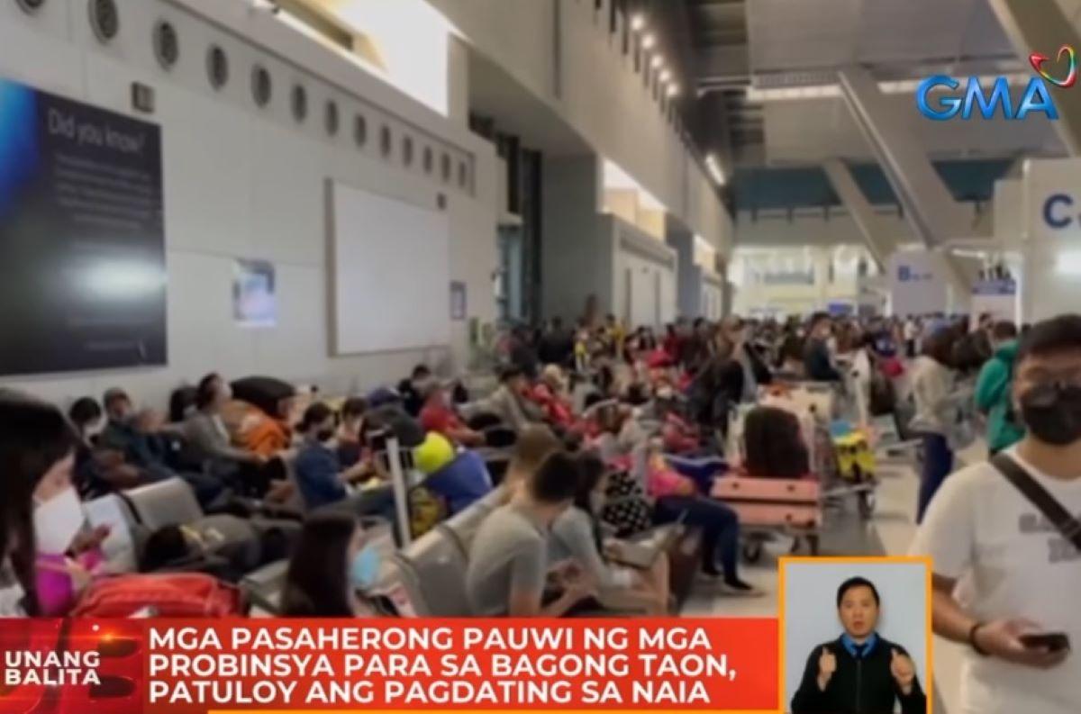 Passengers crowd NAIA on New Year's Eve for flights to provinces | GMA ...