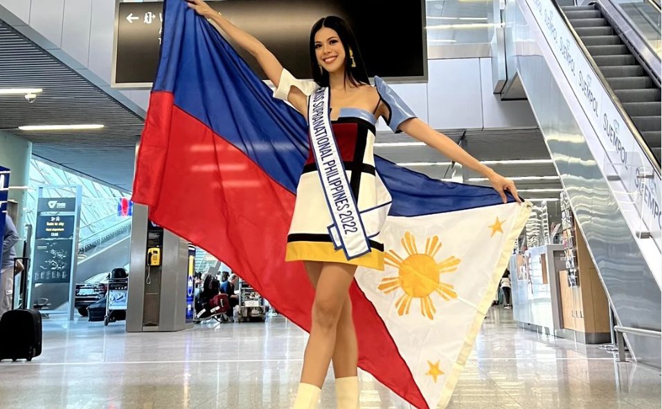 Alison Black waves Philippine flag upon arrival in Poland for Miss ...