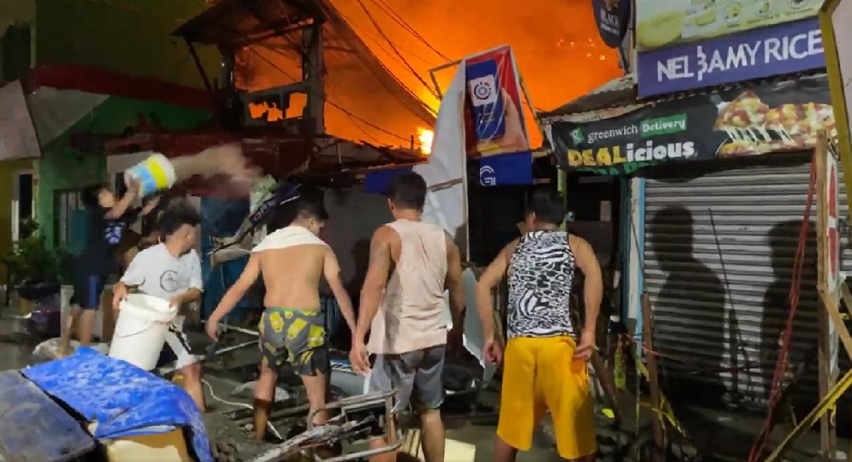 Fire hits residential area in Parañaque, reaches 4th alarm; two hurt ...