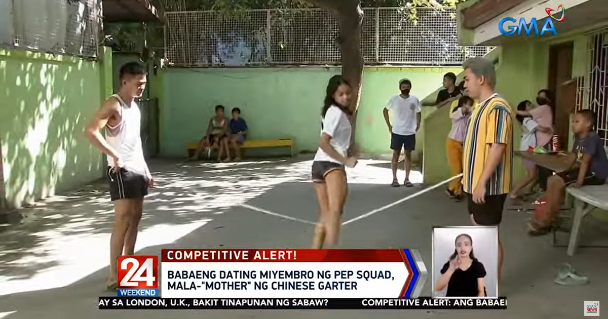 Former pep squad member busts out moves while playing Chinese garter ...