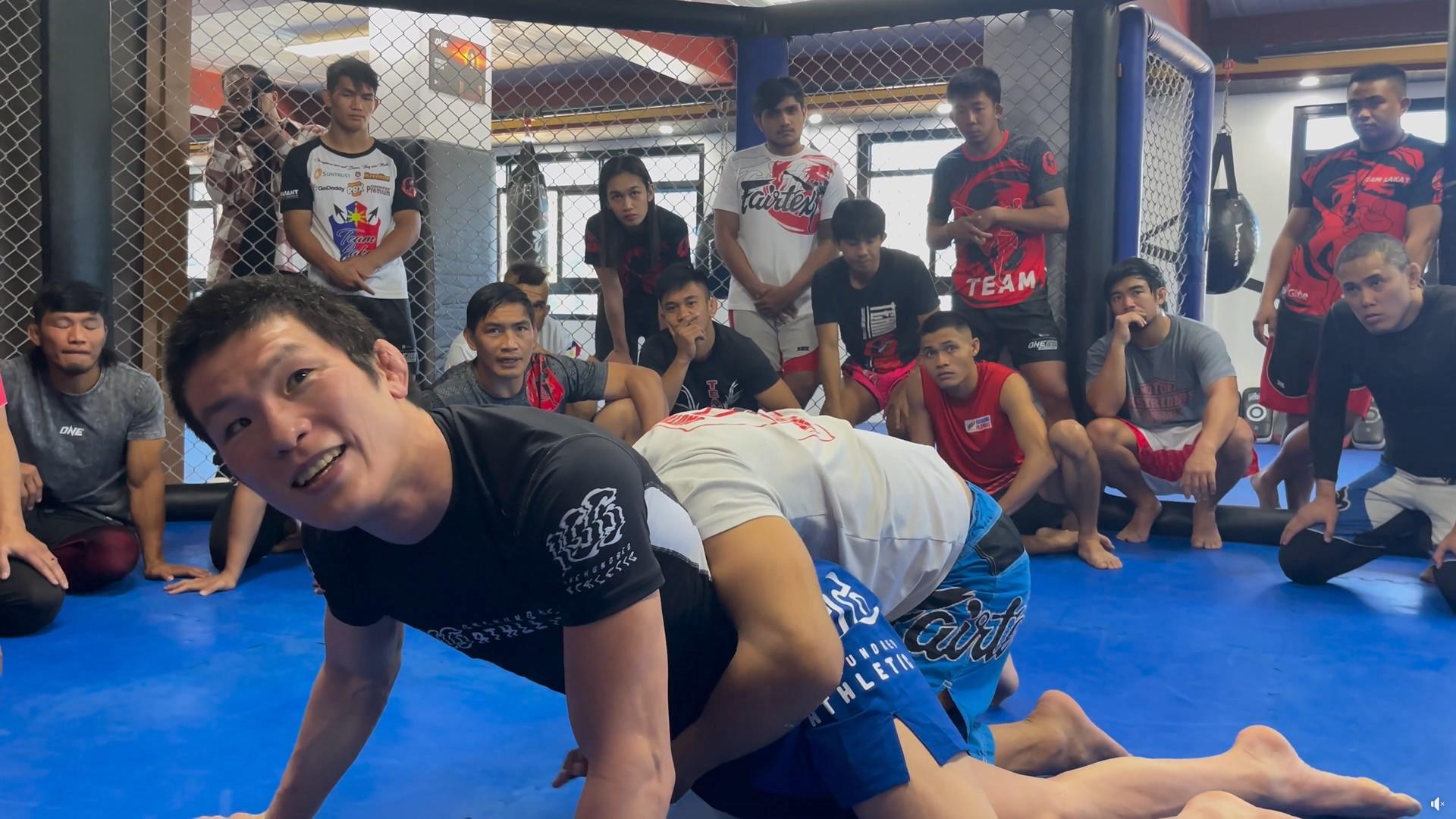 Shinya Aoki visits Baguio City, trains with Team Lakay | GMA News Online
