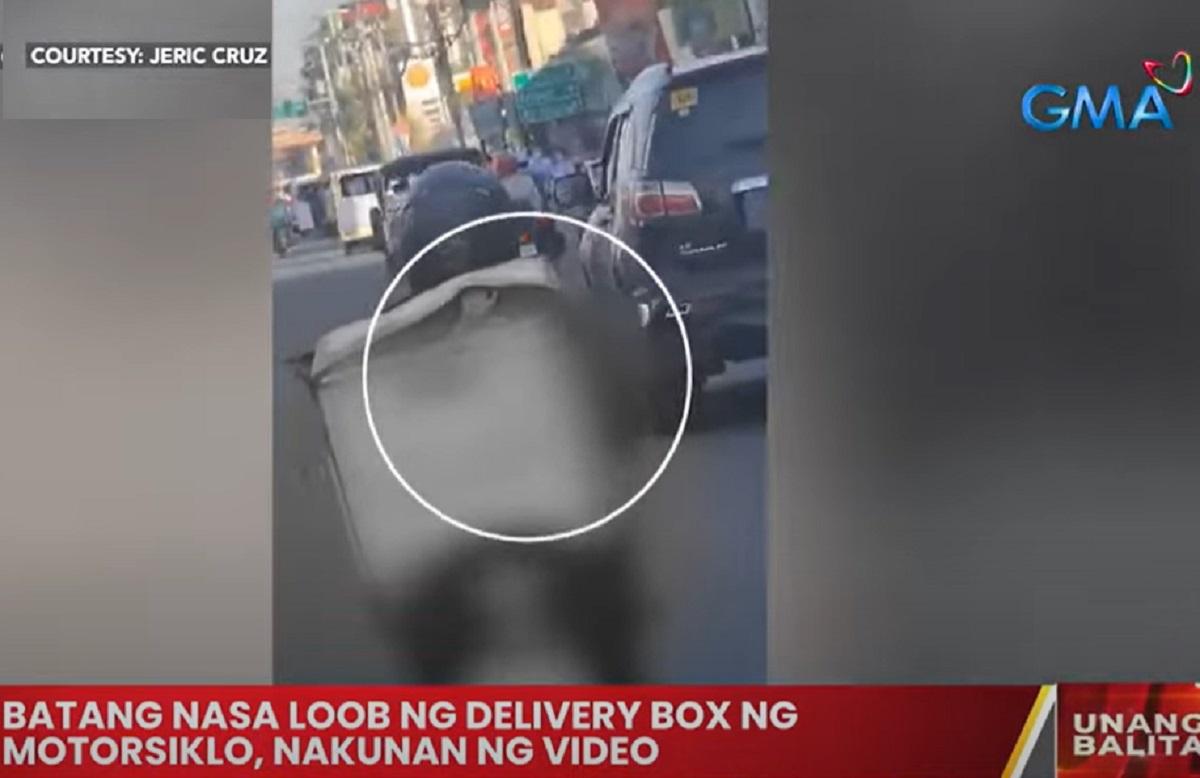 Batang nasa loob ng delivery box ng motorsiklo, nakunan ng video ...
