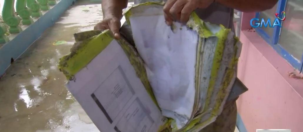 Flood destroys modules in Bulacan schools | GMA News Online