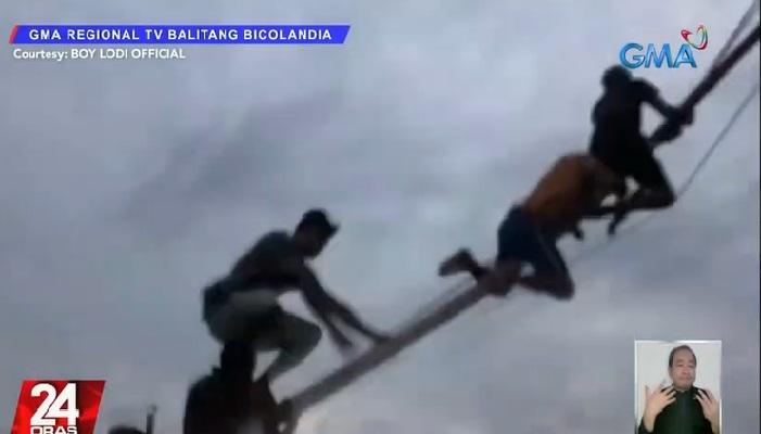 Kawayang ginamit sa palo-sebo, nabali; 4 na umaakyat, nalaglag ...