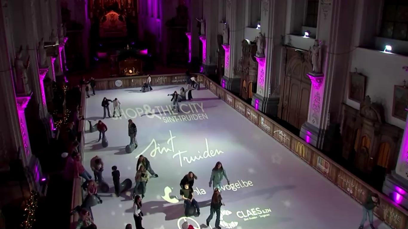 Christmas revelers ice skate down the aisle in Belgian church | GMA ...