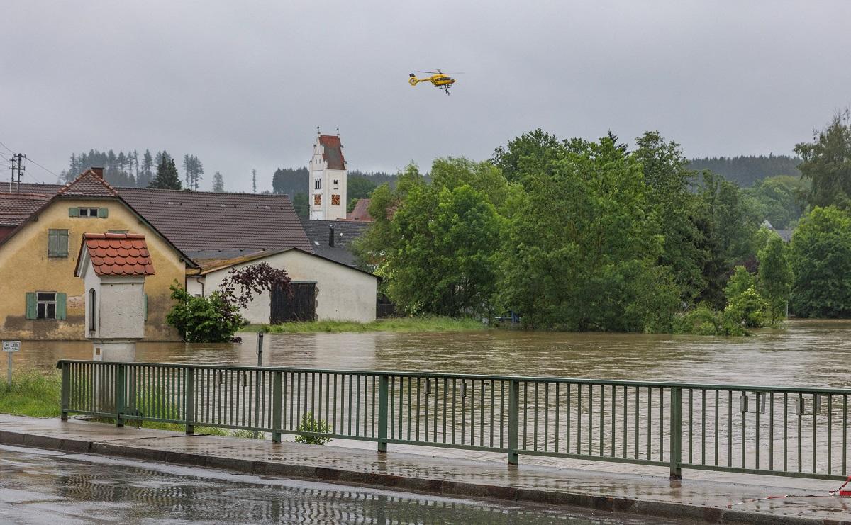 Thousands evacuated in southern Germany floods; rescue worker dies ...