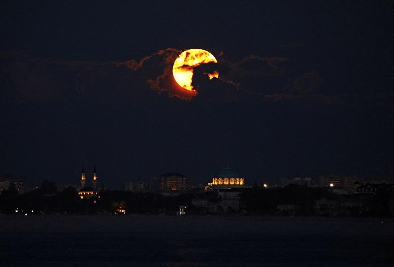 A view shows the full moon, known as the Hunter's moon, in Crimea ...
