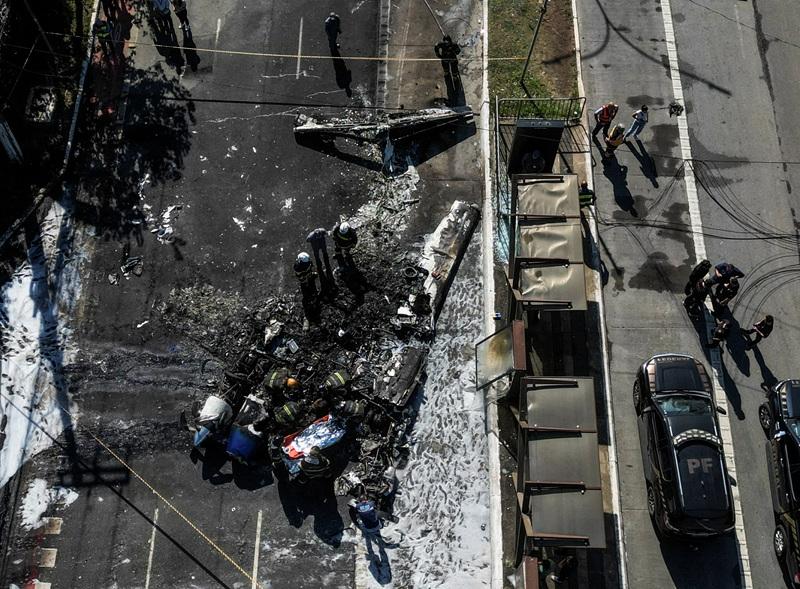 Two dead as small plane crashes into bus on busy Sao Paulo avenue | GMA ...