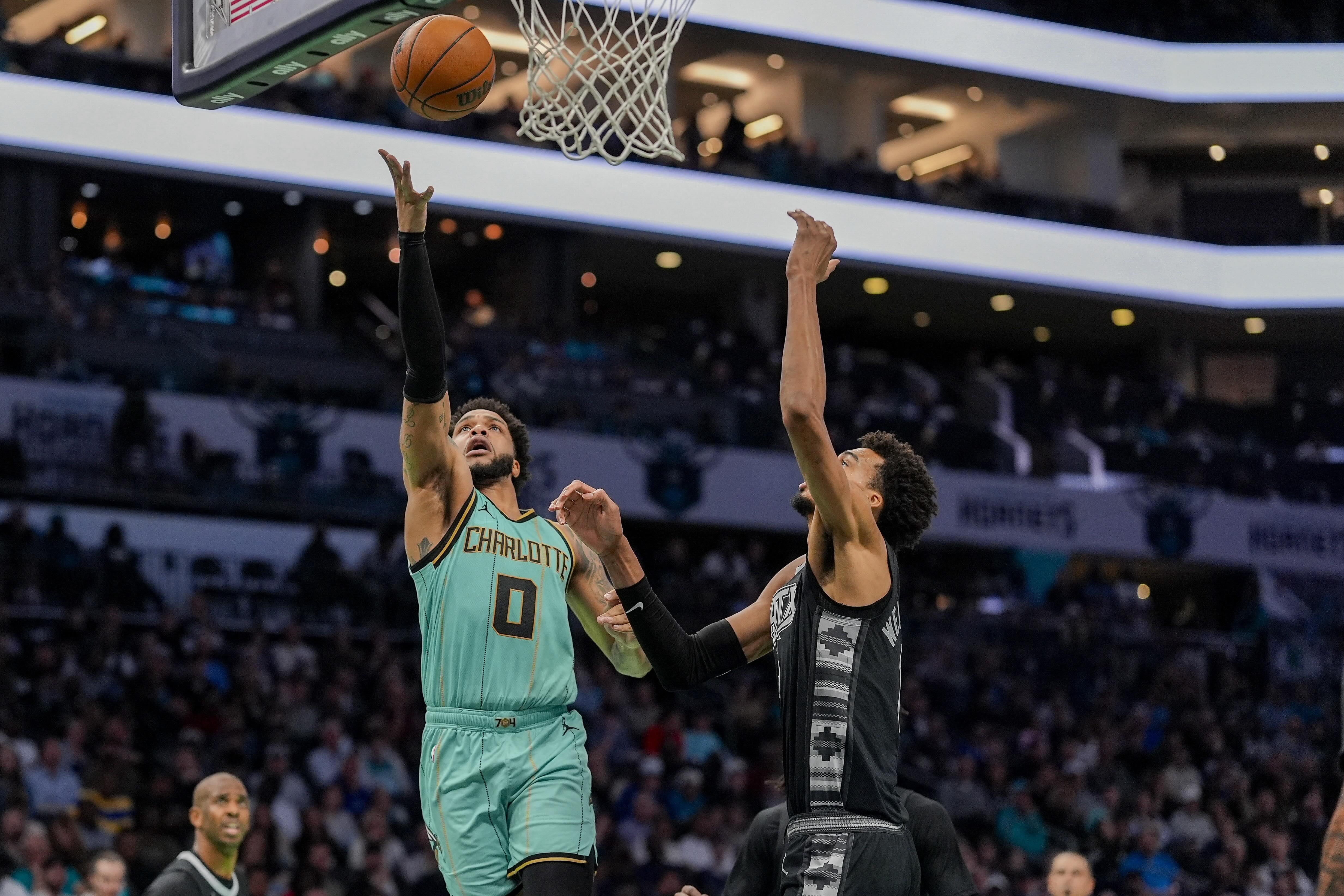 NBA: Hornets use late three vs. Spurs to halt six-game slide | GMA News Online
