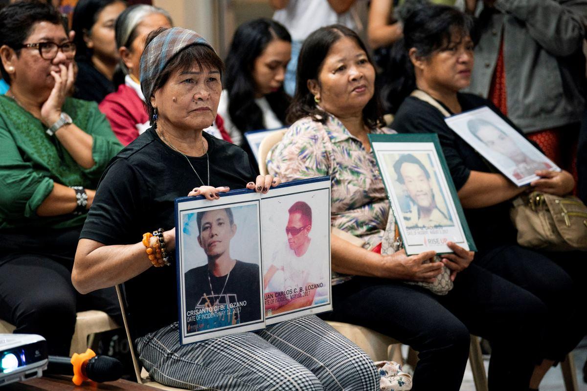 EJK victims' kin watch livestream of Duterte's appearance at ICC ...