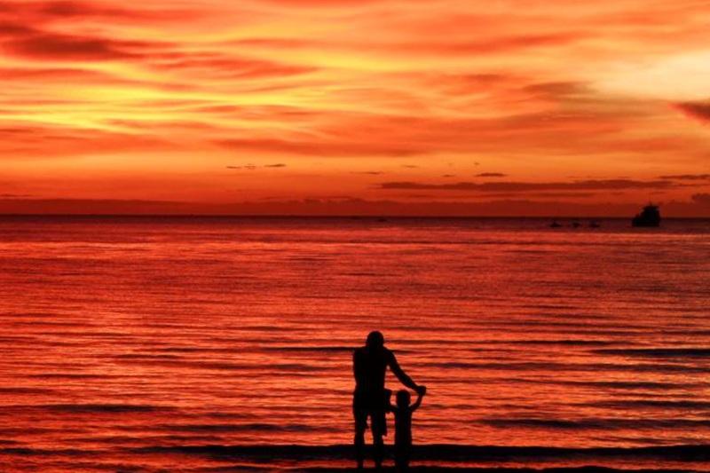 Local and foreign tourists are drawn to watch the picturesque sunset in ...